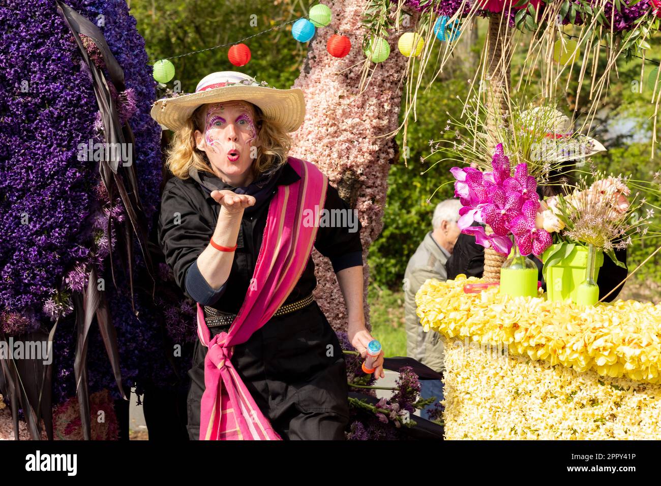 Noordwijk, THE NETHERLANDS - April 22, 2023: Happy person with a hand ...