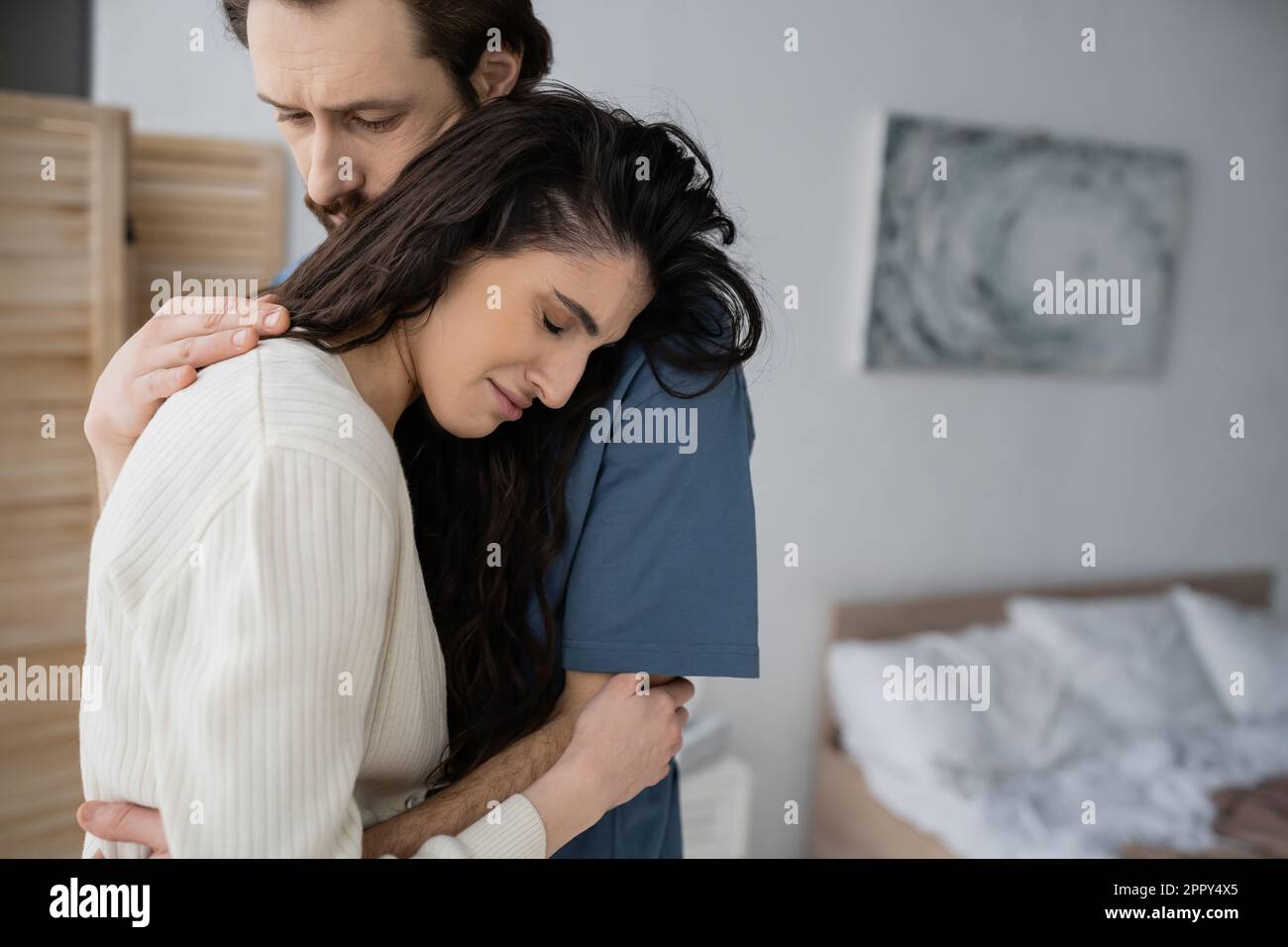Boy And Girl Hugging And Crying