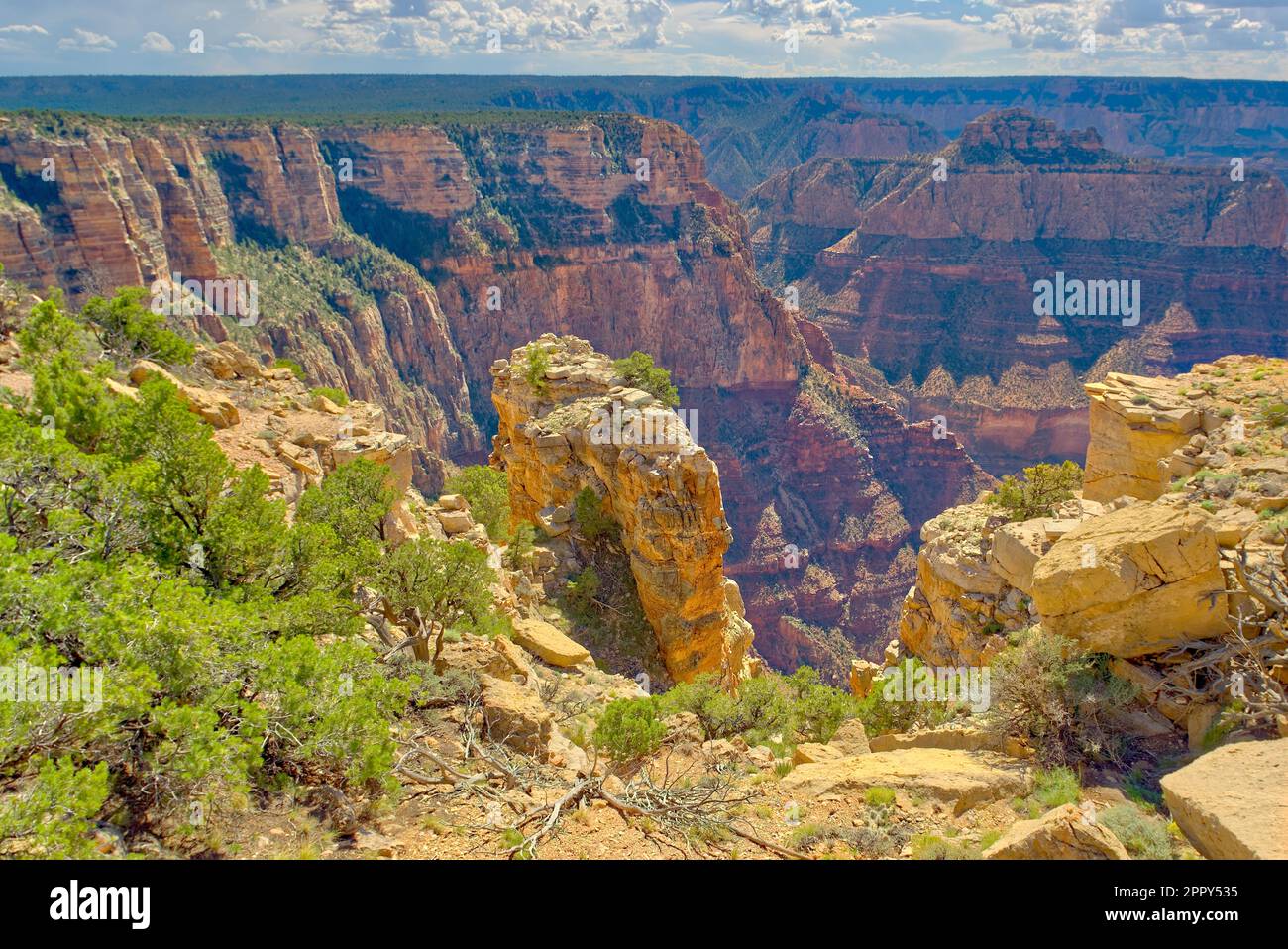 A rock spire separate from the cliff wall west of Zuni Point at Grand ...