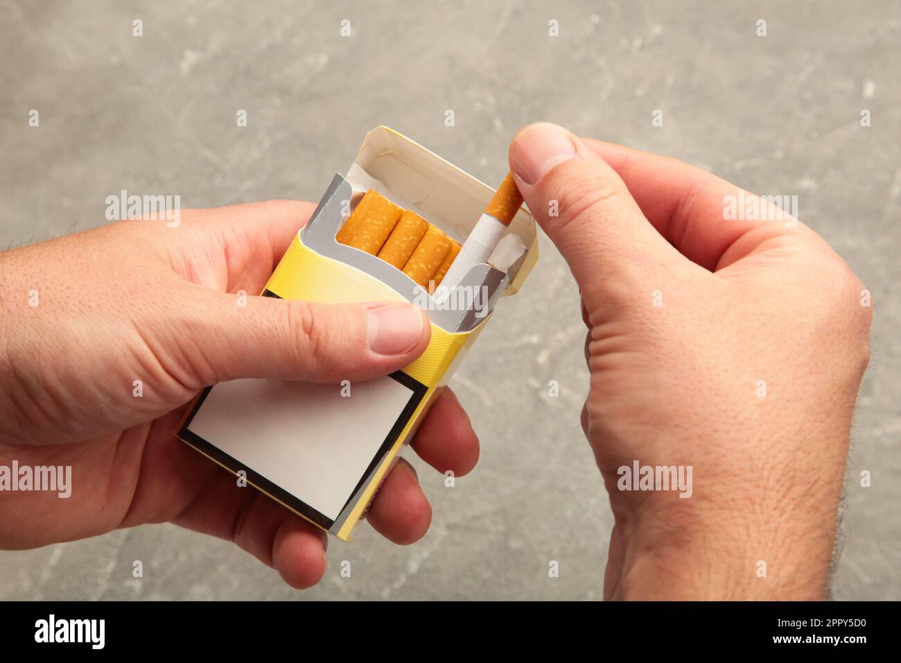 Photo man smoking cigarette hi-res stock photography and images - Alamy