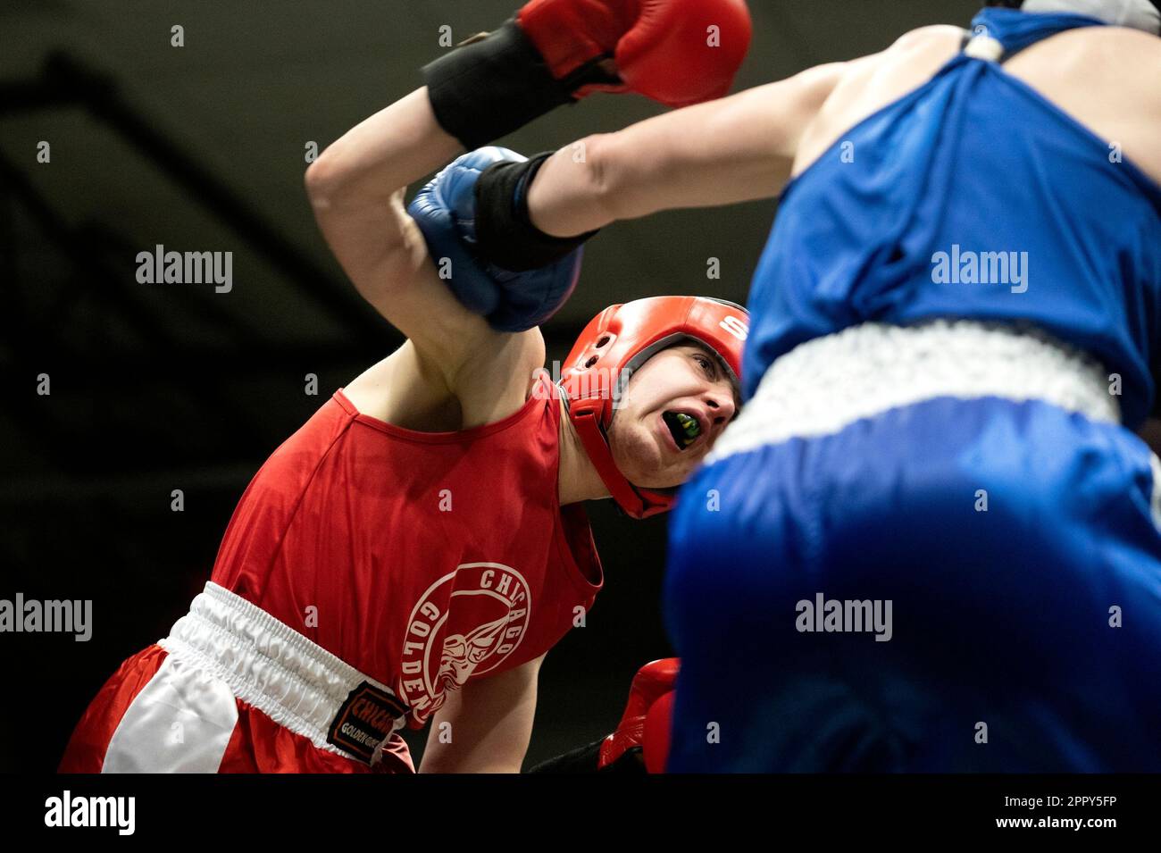 Claire Quinn, left, battles Stacey Parker in the 156-pound championship ...
