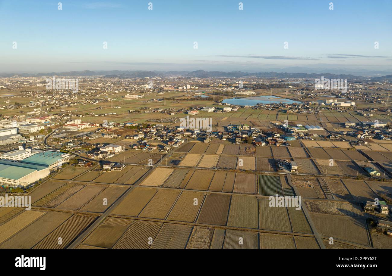 Aerial view of dry farms in rural landscape at golden hour Stock Photo ...