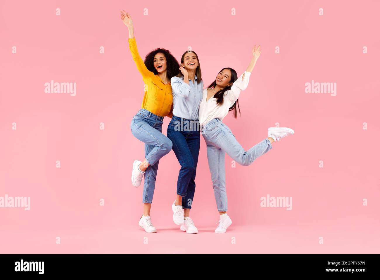 Female friendship concept. Joyful diverse ladies embracing and having ...
