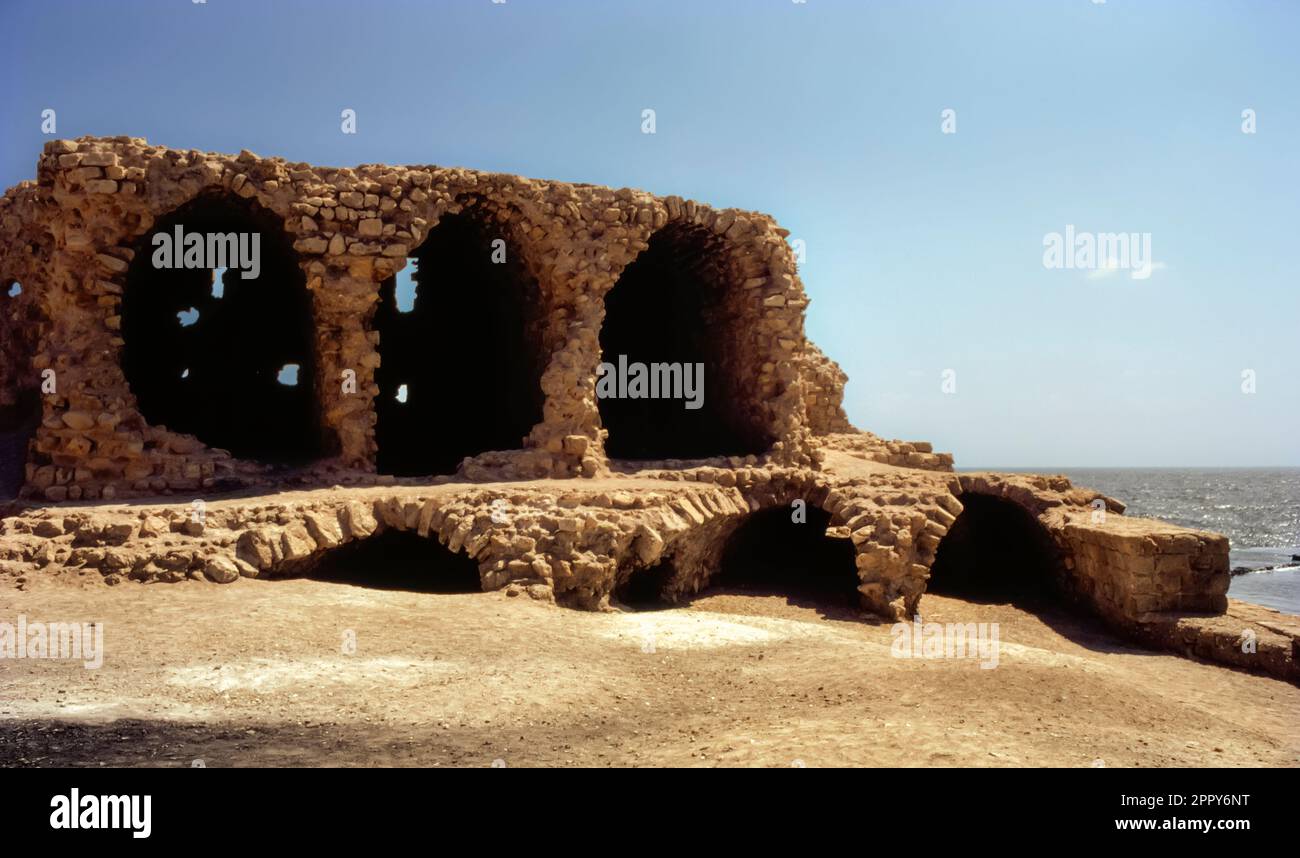 Arched ruins of the crusader port in the old city of Acre on the shores ...