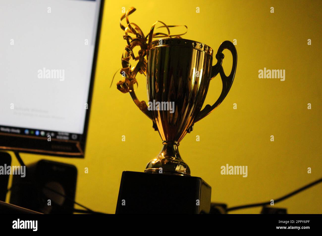 gold color trophy Stock Photo - Alamy