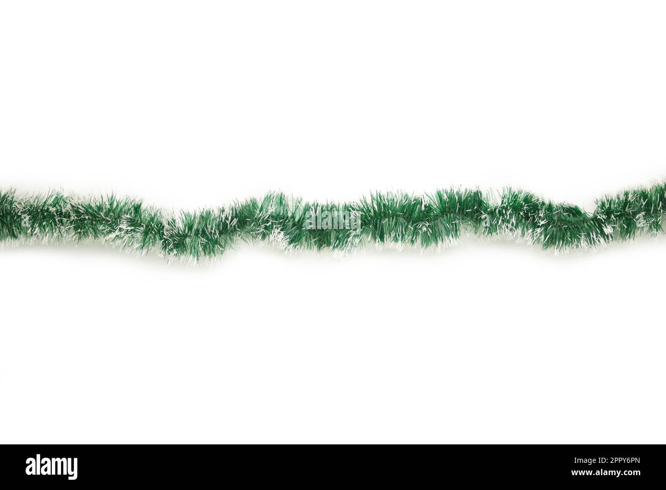 Christmas green tinsel isolated on white background Stock Photo - Alamy