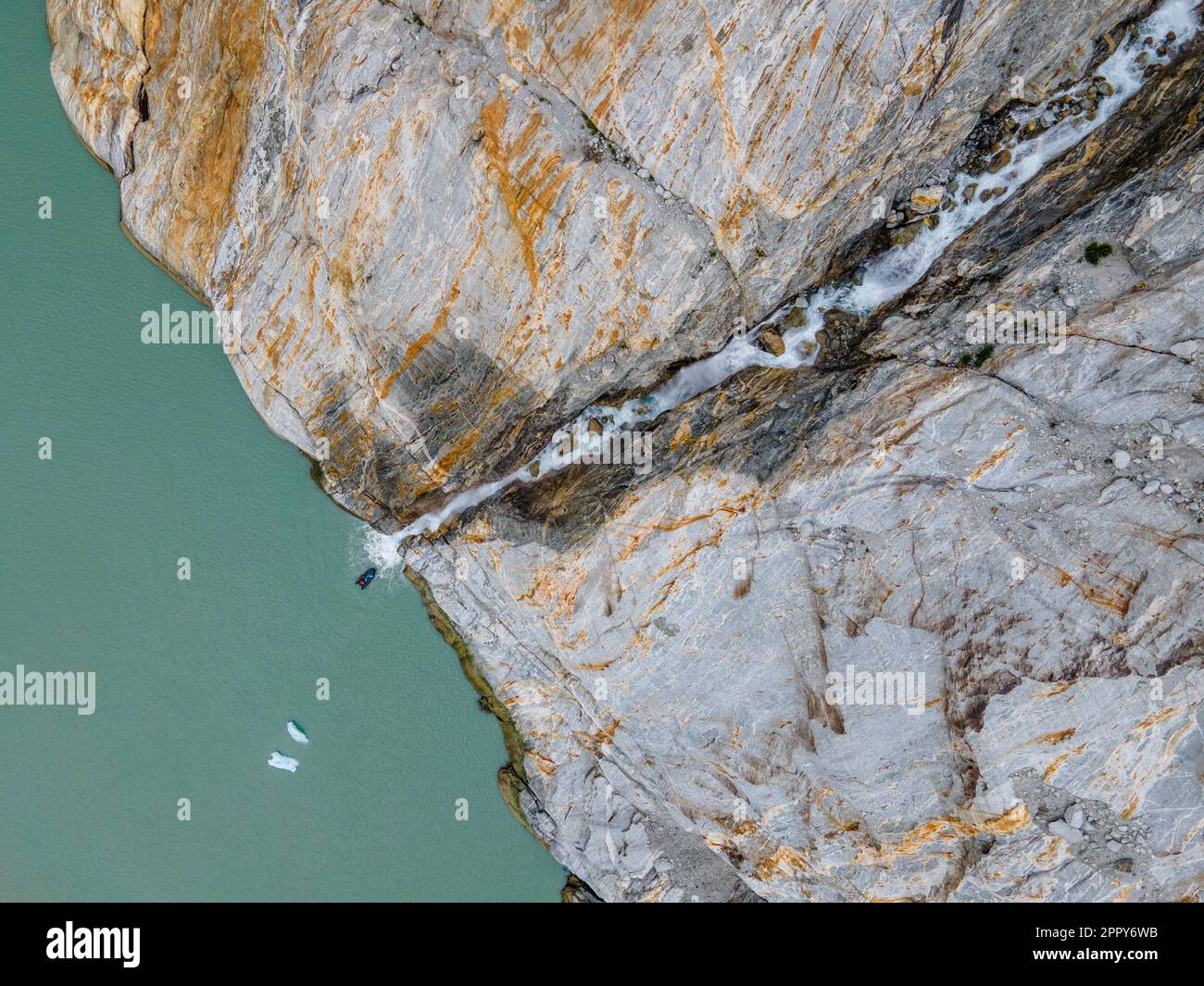Aerial top down view of a zodiac with tourist viewing Misty Fjords ...