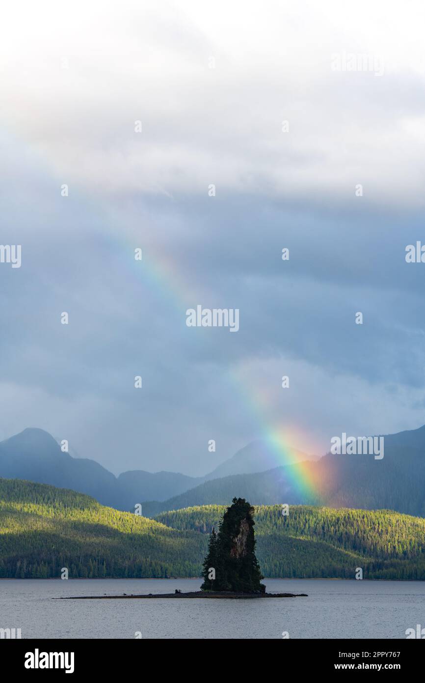 Beautiful rainbow over New Eddystone Rock Stock Photo - Alamy