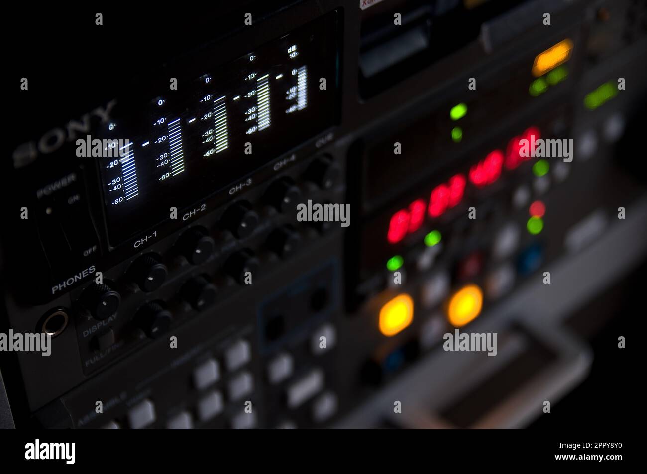 A variety of knobs and switches on a radio broadcasting console Stock ...