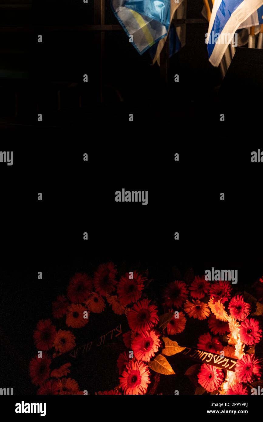 Harish, Israel. A laurels and a Israeli flag at a memorial day service ...