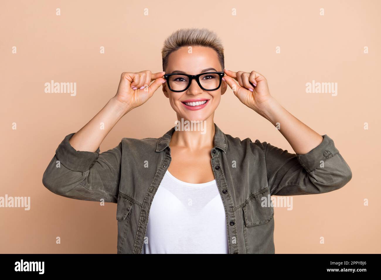 Photo of charming nice person beaming smile arms touch glasses isolated ...