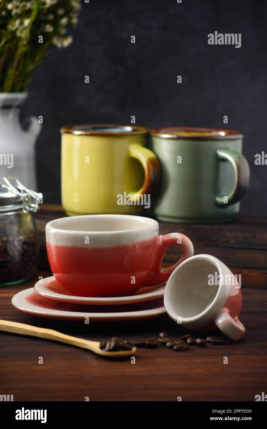 Coffee cups of different sizes and colors Stock Photo - Alamy