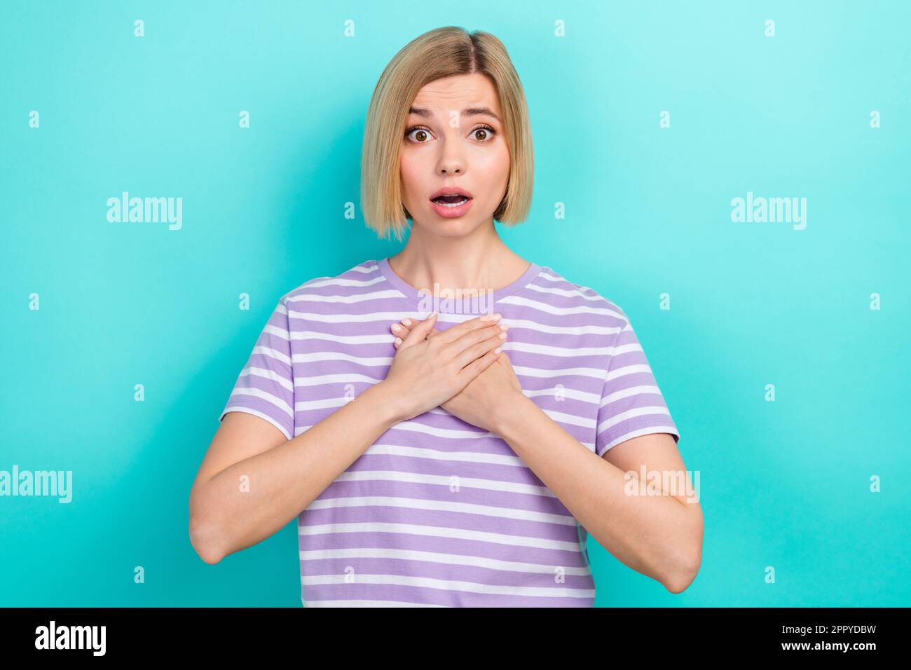 Photo of astonished impressed woman with bob hairdo dressed striped t ...