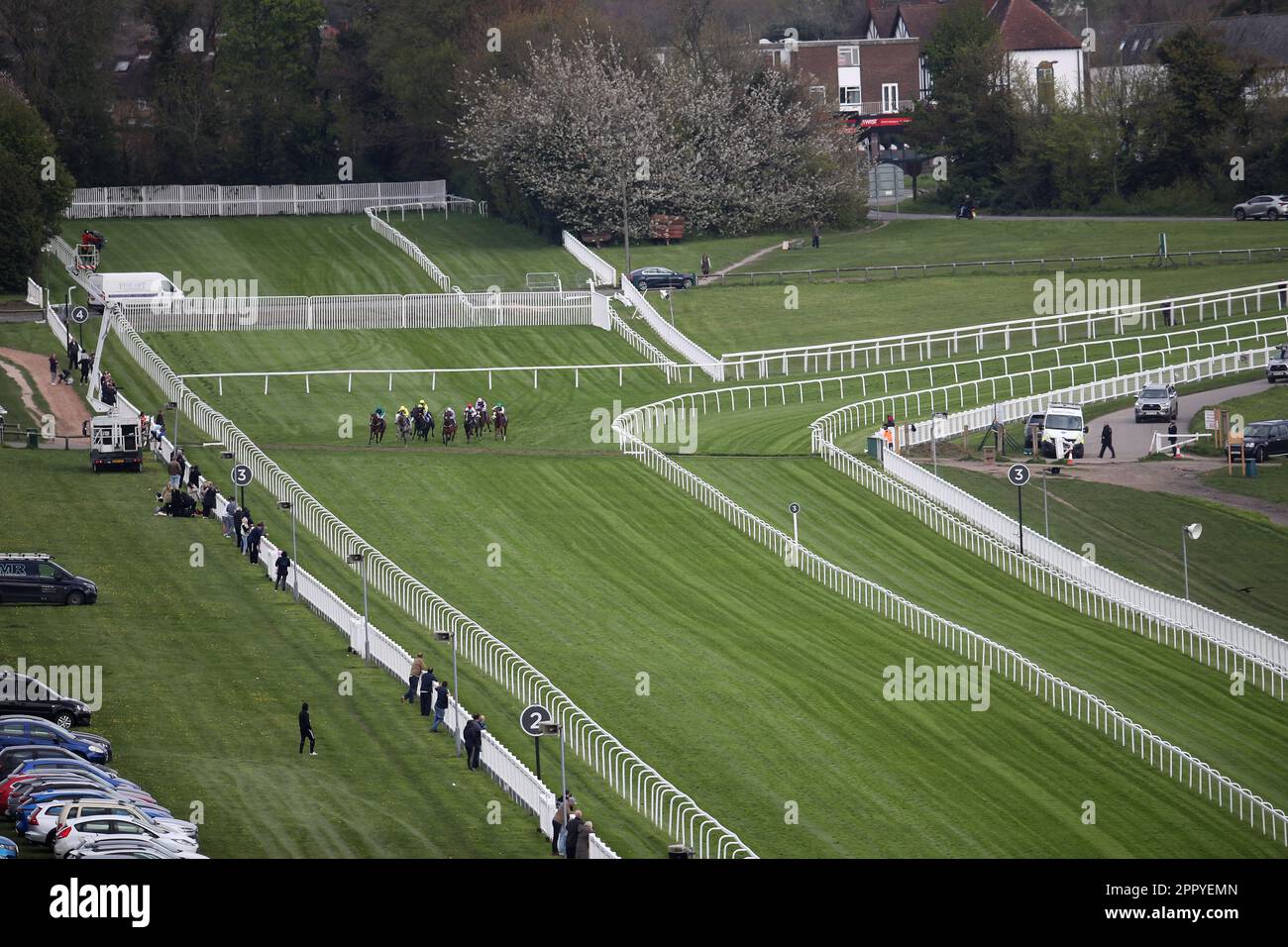 Runners and riders in action during the Warren Handicap at Epsom Downs ...