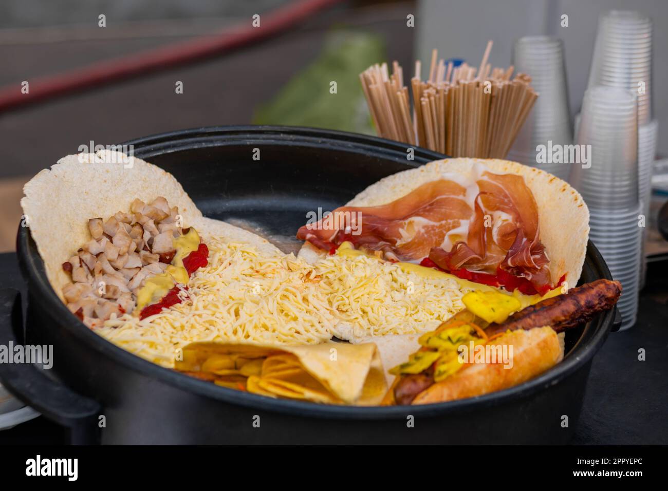 Process of grilling tortilla sandwich on grill - outdoor cooking Stock ...