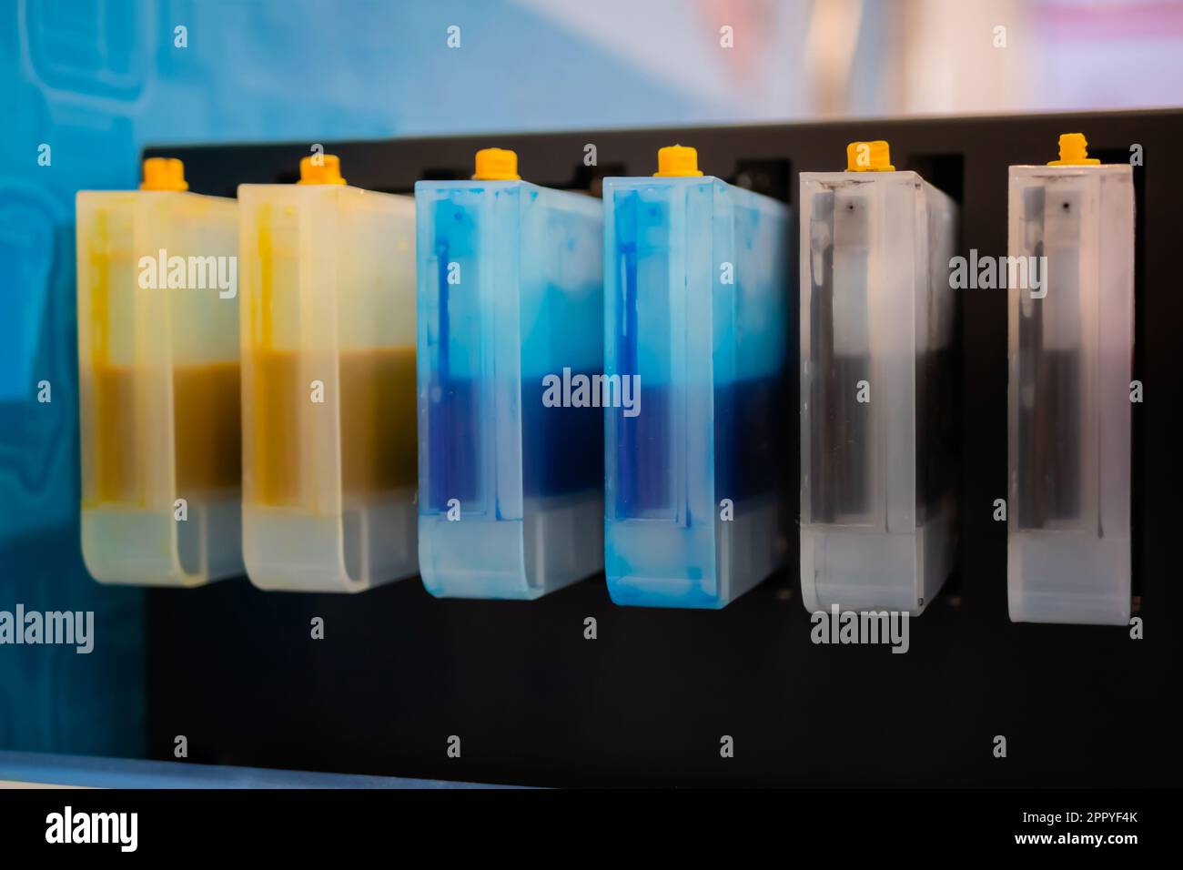 Row of inkjet printer CMYK cartridges - close up Stock Photo - Alamy