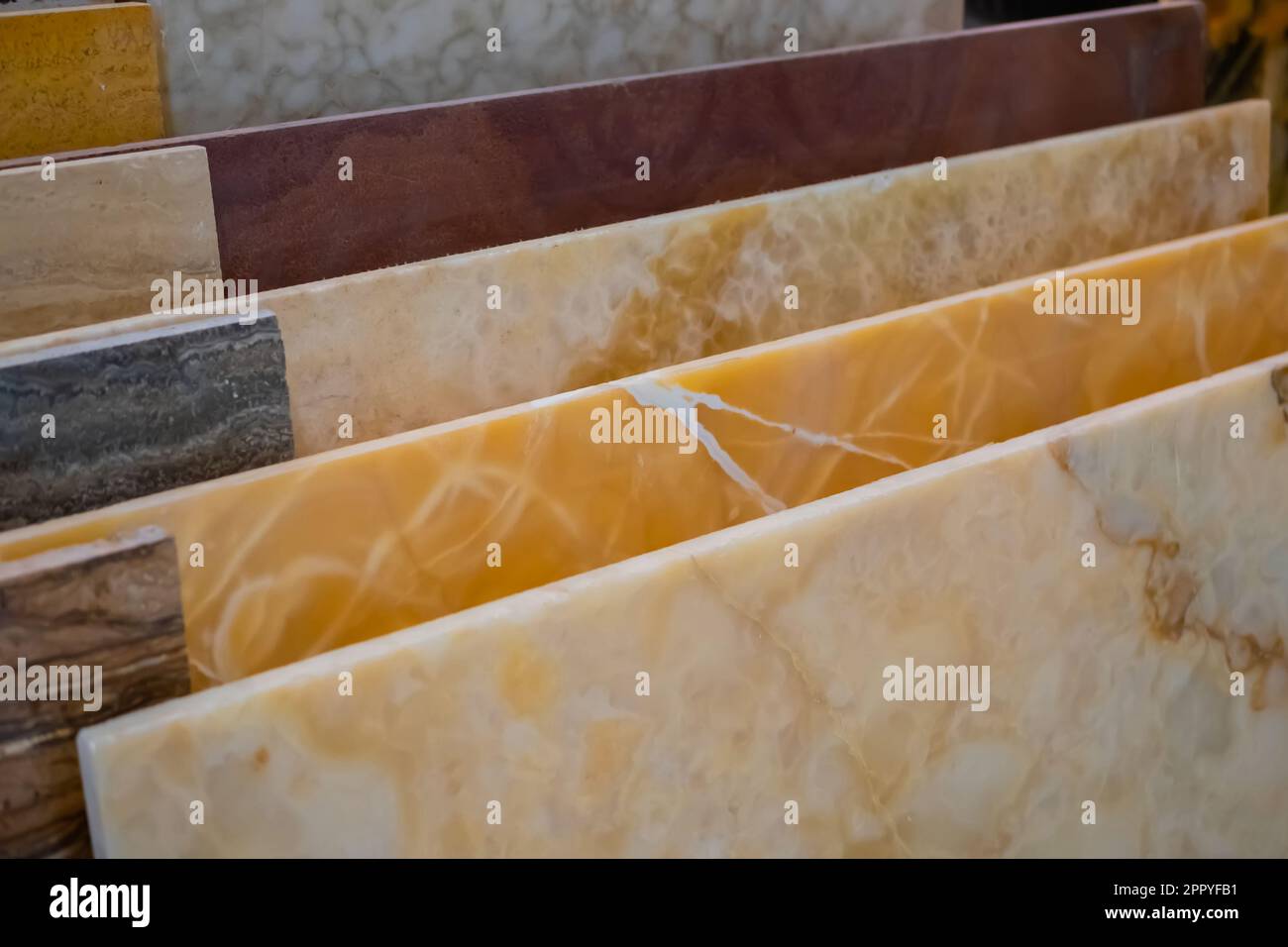 Colorful granite and marble stone slabs on counter for sale at hardware ...