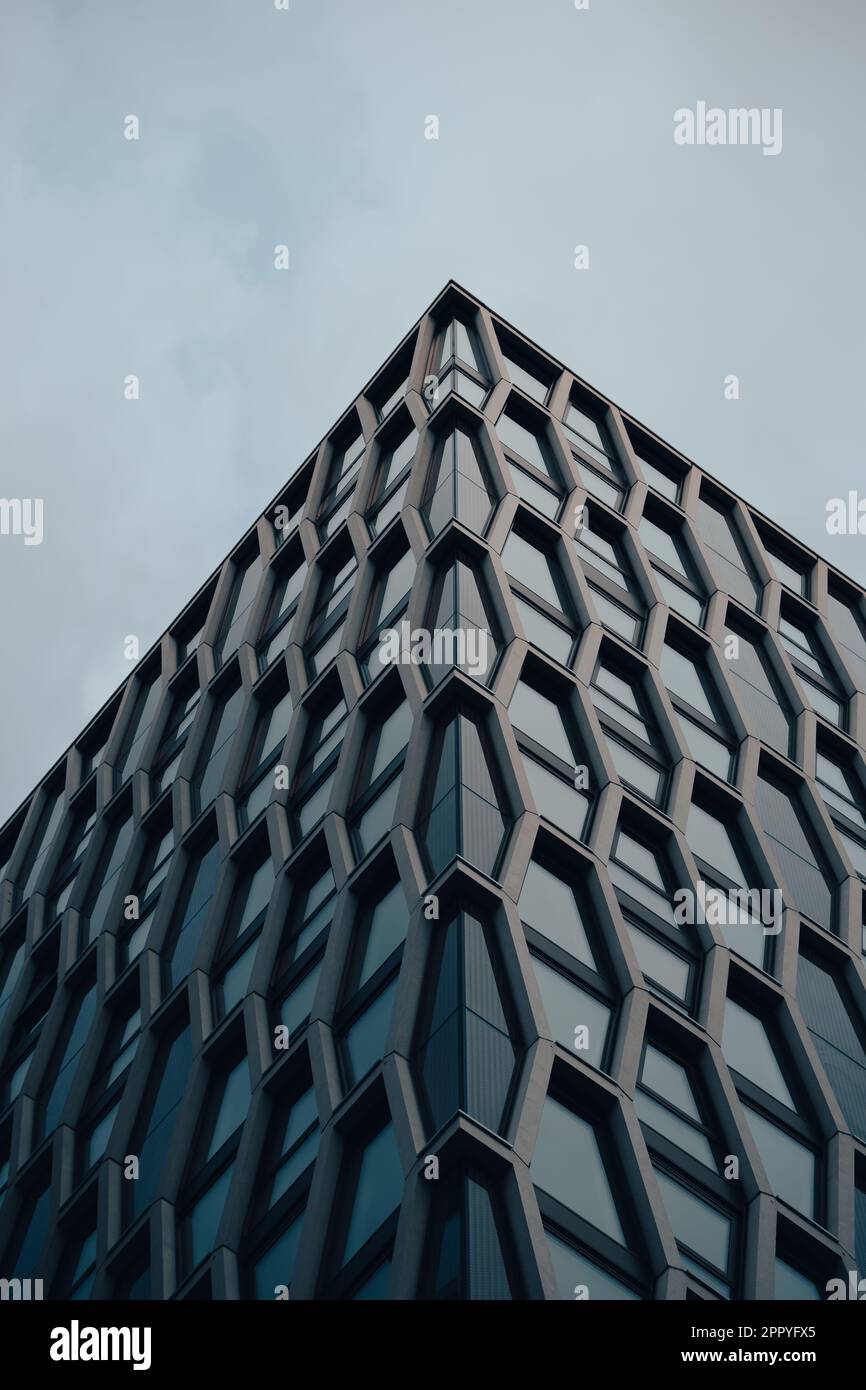 Hexagon windows on a skyscraper, blue hexagonal glass, tall building ...