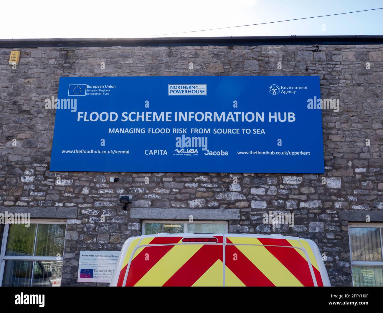 A sign about new flood defences being built on the River Kent in Kendal ...