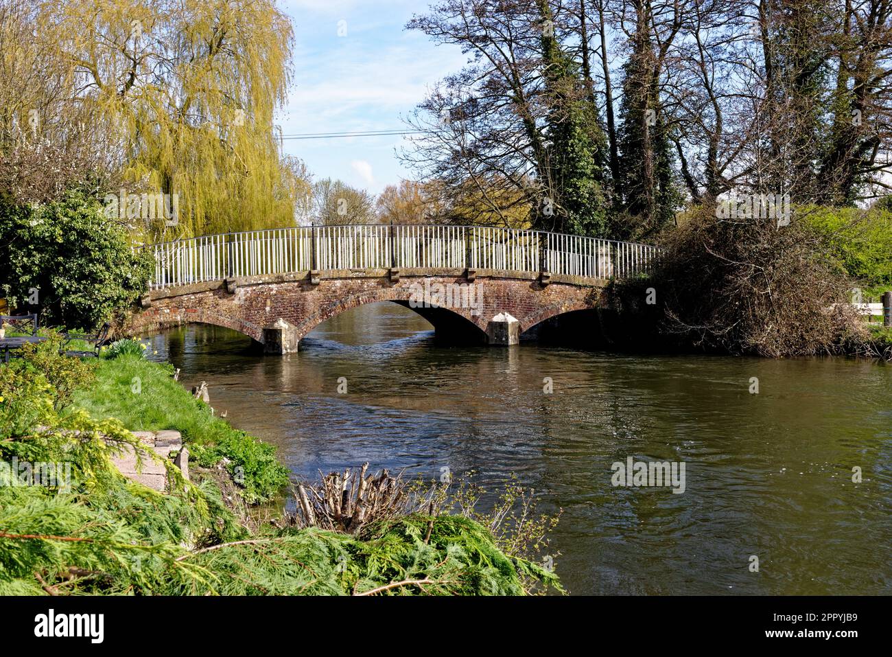 Red brick arched bridge with metal railing over the Avon river (Bristol ...