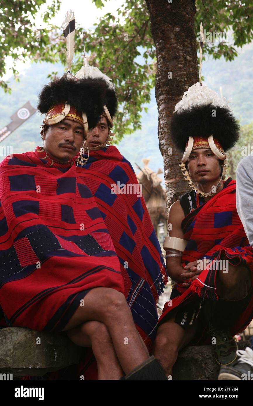 Naga tribesmen resting Stock Photo - Alamy
