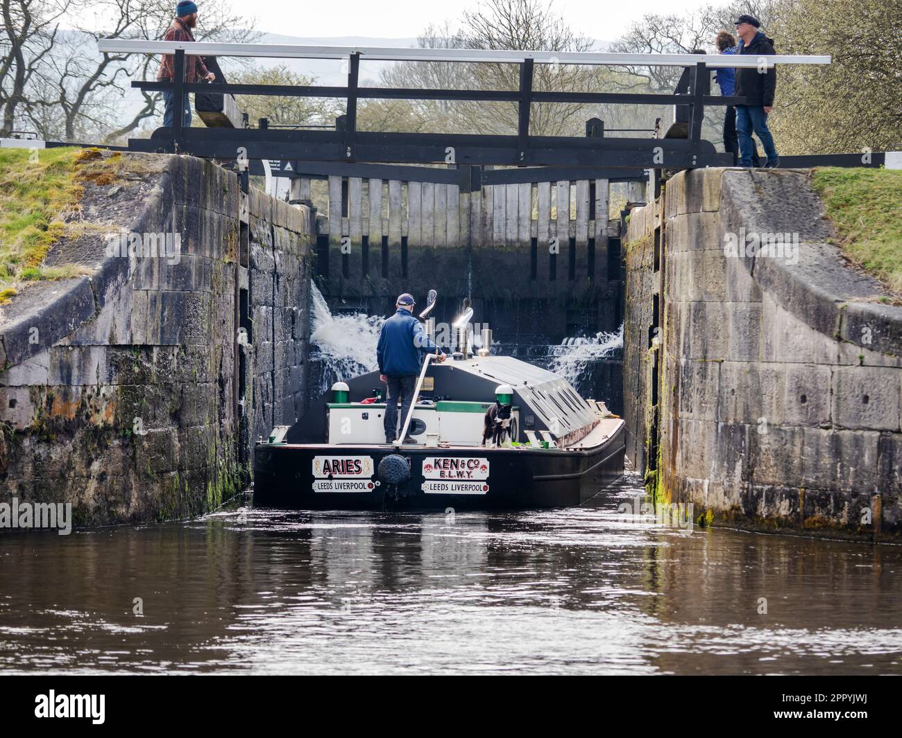 A boat going through a lock on the Leeds Liverpool Canal at ...