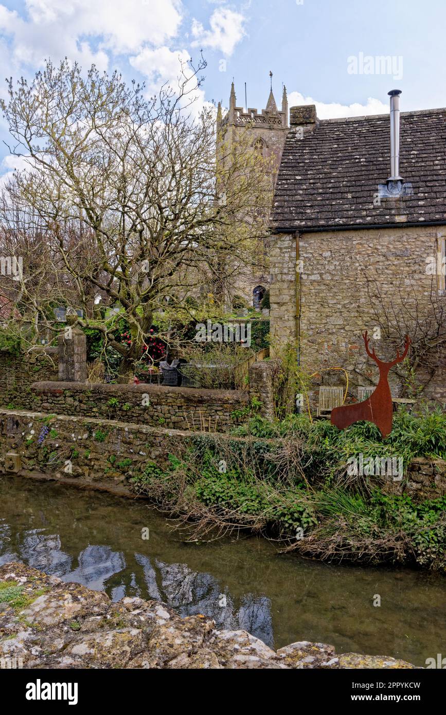 Pretty cottages and the Mells River at Nunney. Village of Nunney ...