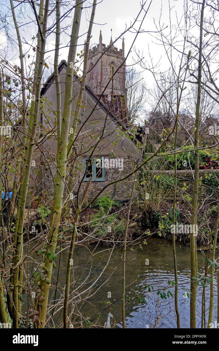 Pretty cottages and the Mells River at Nunney. Village of Nunney ...