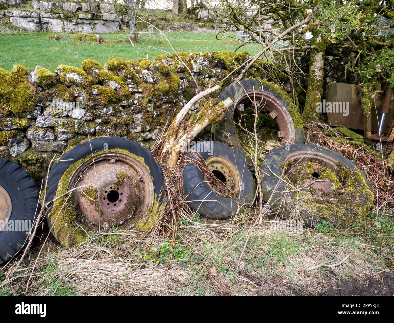 Old tractor wheels on a farm in Chapel-le-Dale, below Whernside ...