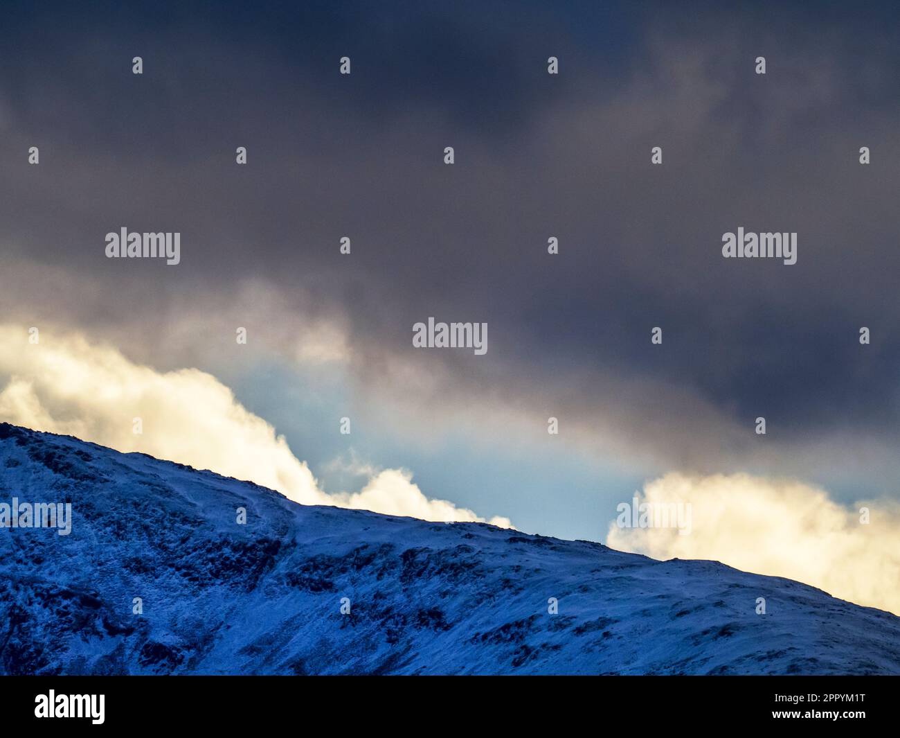 Clouds blowing over Wet side Edge from Ambleside, Lake District, UK ...