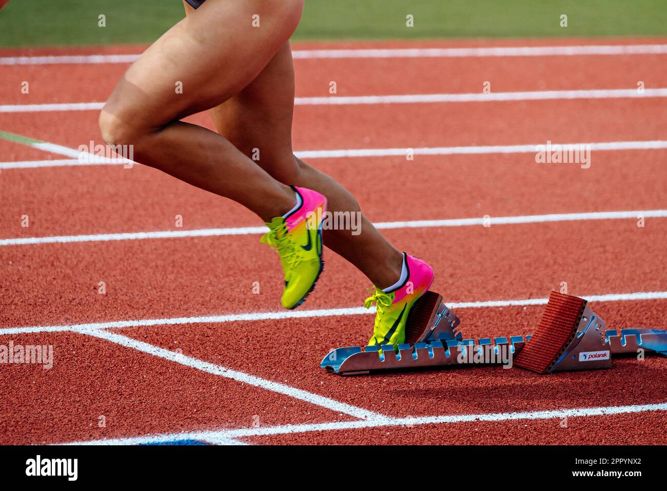 Female athlete in starting blocks hi-res stock photography and images ...
