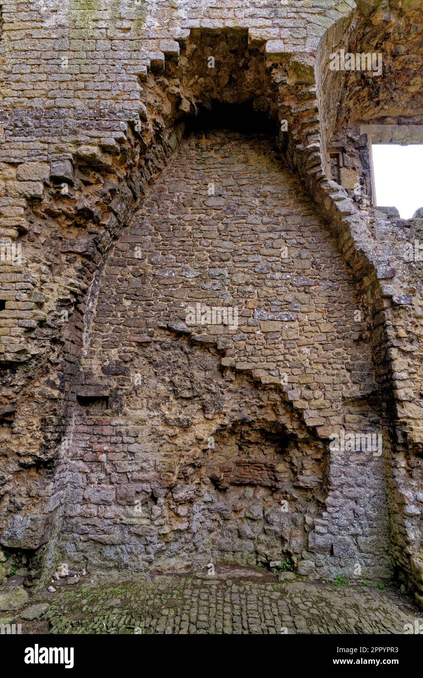 Inside walls of Nunney Castle and moat in the village of Nunney. Built ...