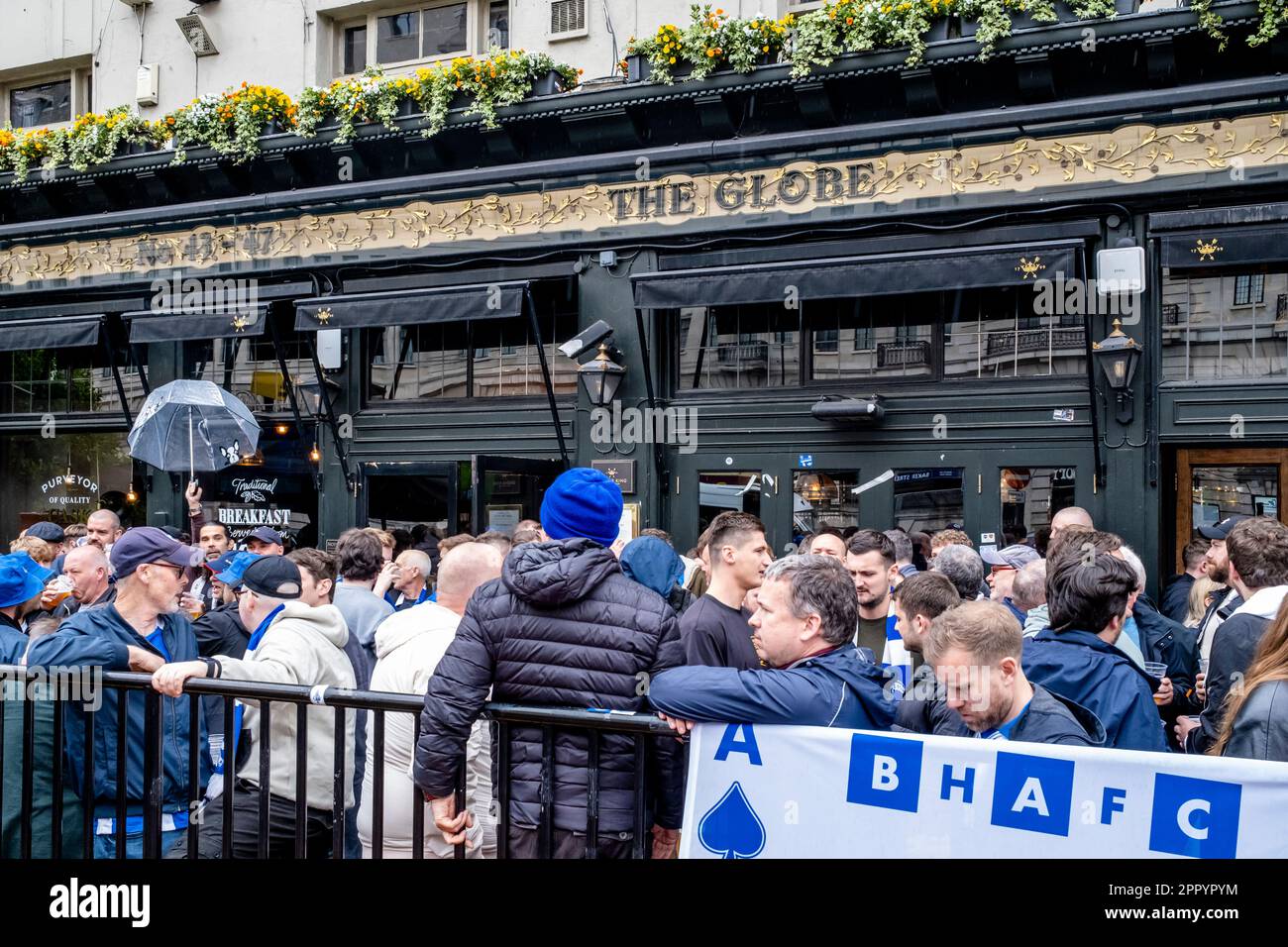 Football Fans Of Brighton and Hove Albion FC Standing Outside The Globe ...