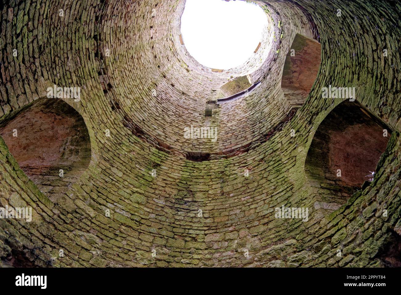 Inside walls of Nunney Castle and moat in the village of Nunney. Built ...