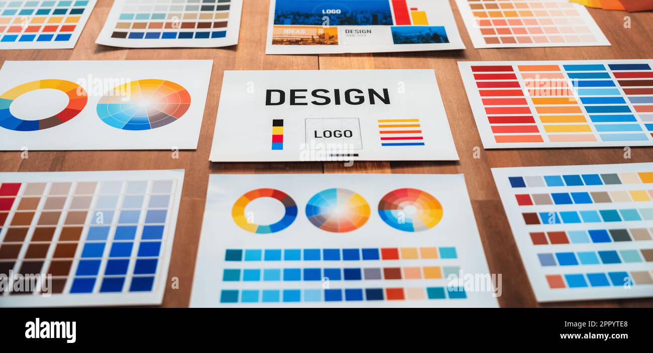Panorama shot of various color palette idea papers arranged neatly on ...