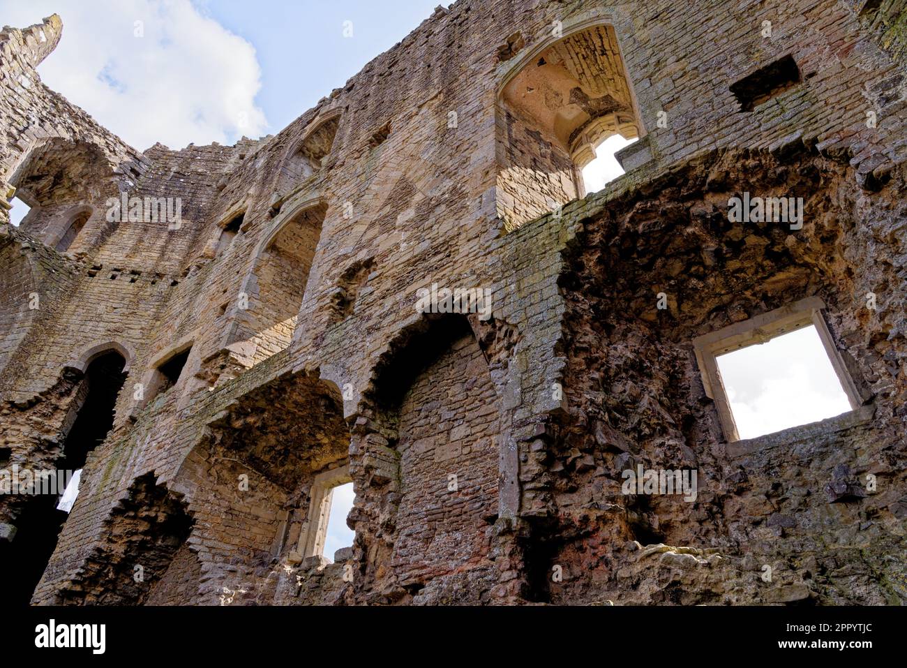Inside walls of Nunney Castle and moat in the village of Nunney. Built ...