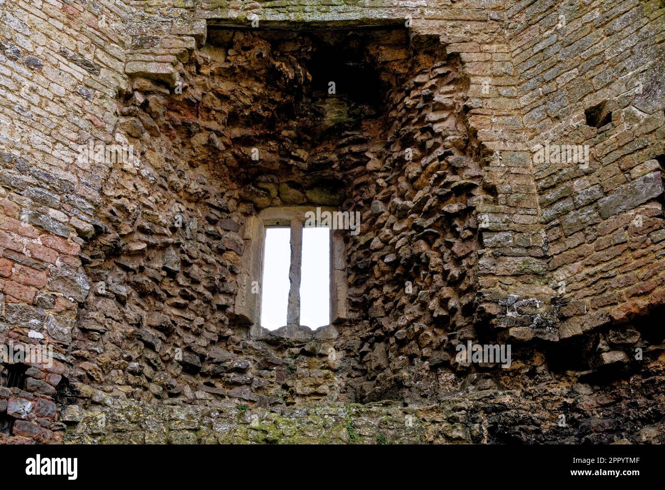 Inside walls of Nunney Castle and moat in the village of Nunney. Built ...