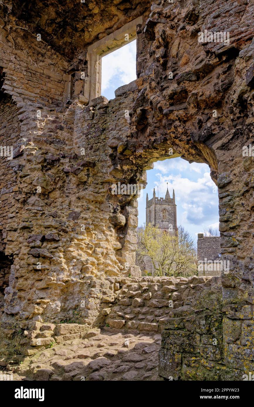 Inside walls of Nunney Castle and moat in the village of Nunney. Built ...