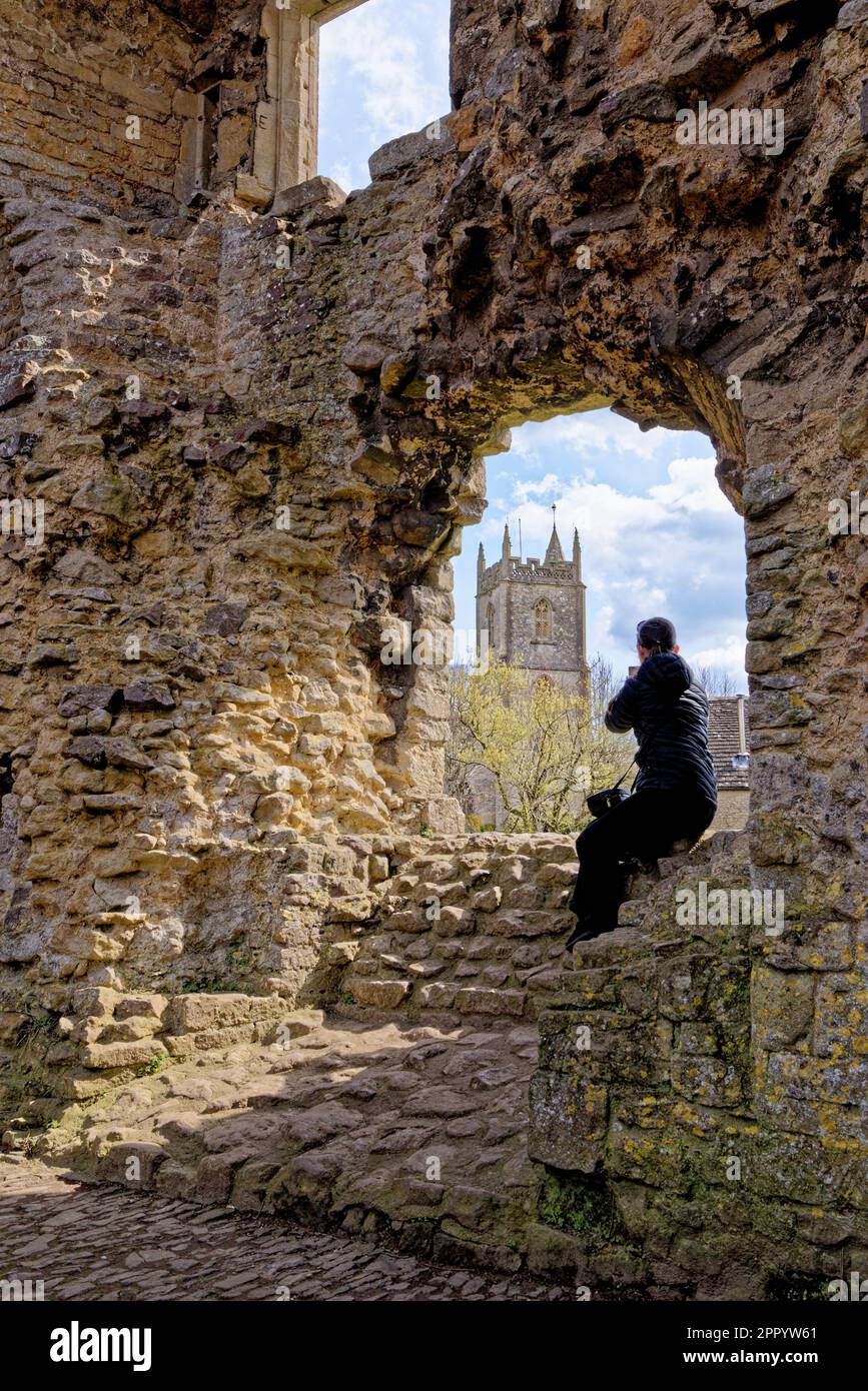 Inside walls of Nunney Castle and moat in the village of Nunney. Built ...