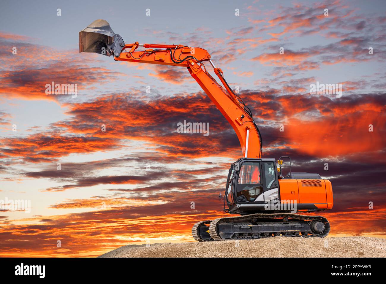 excavator is working and digging at construction site Stock Photo - Alamy