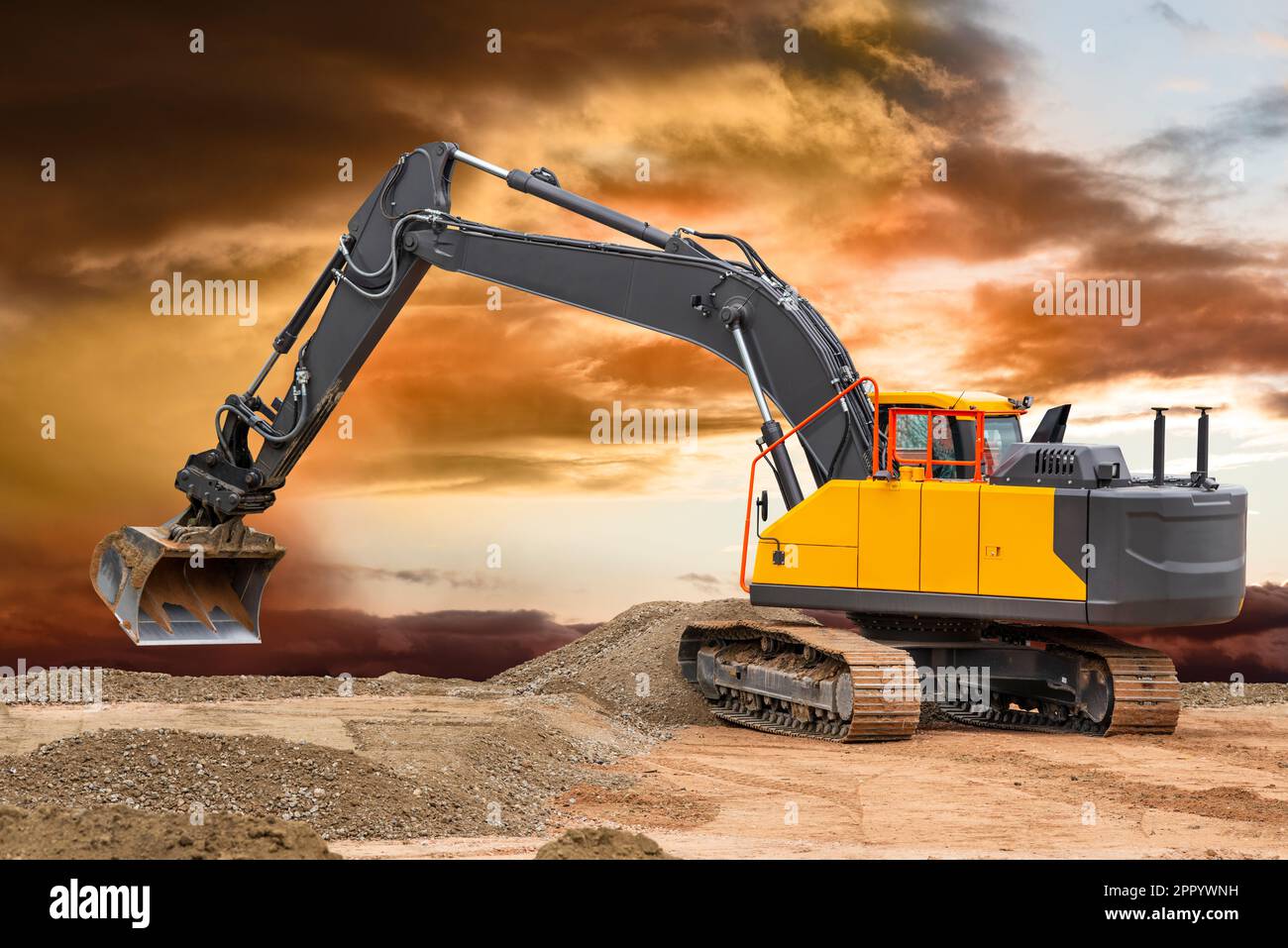 excavator is working and digging at construction site Stock Photo - Alamy