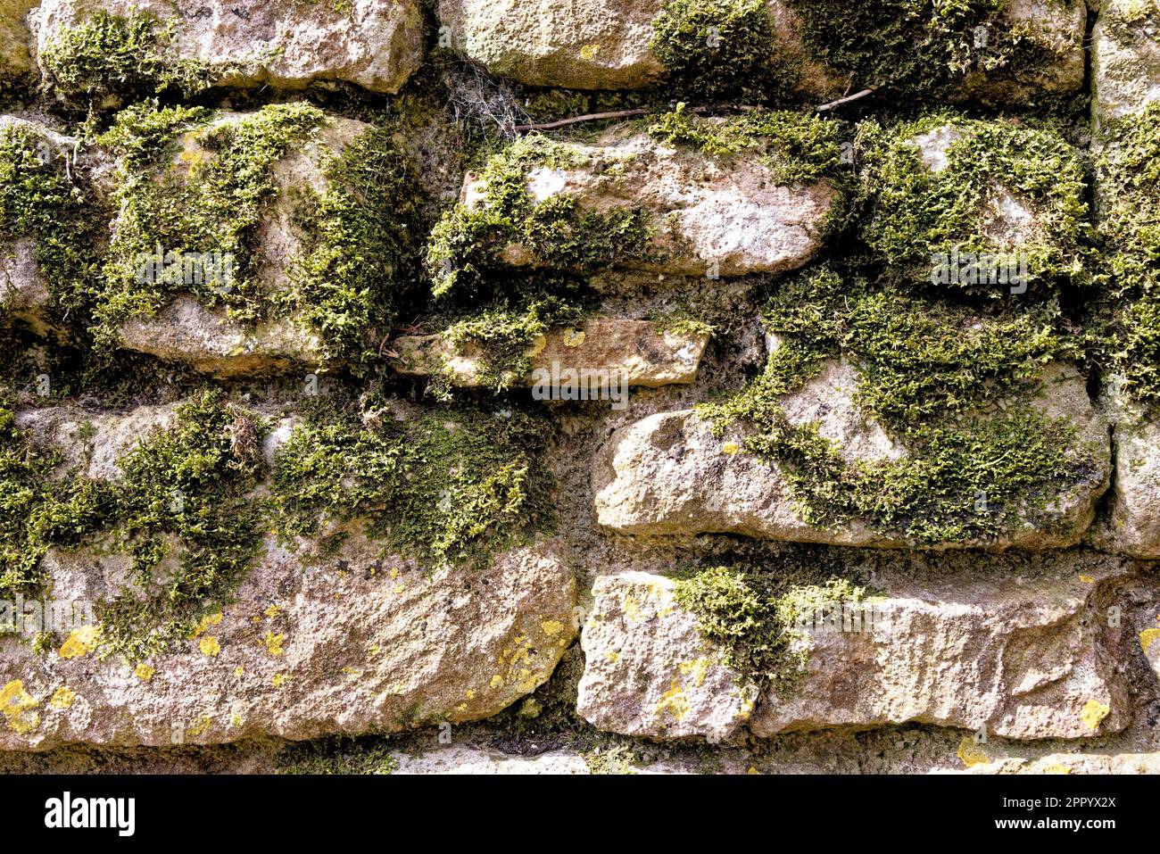 Masonry with different rock types - Closeup of bricks as part of old ...