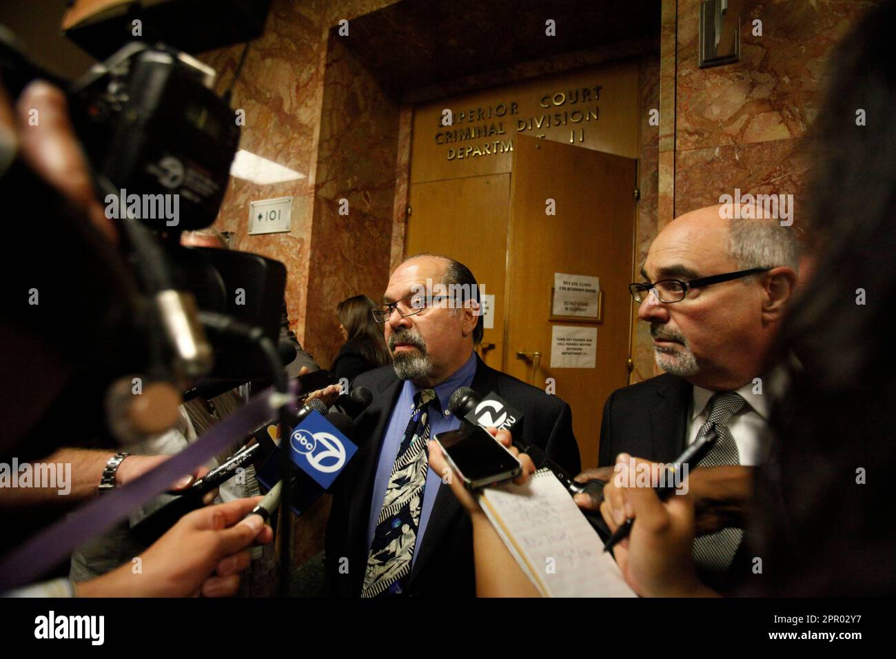 Attorneys Tony Tamburello (l to r) and Eric Safire talk with the media ...