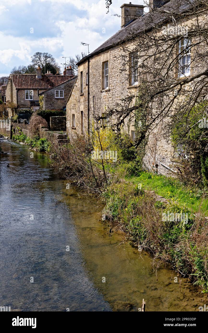 Pretty cottages and the Mells River at Nunney. Village of Nunney ...