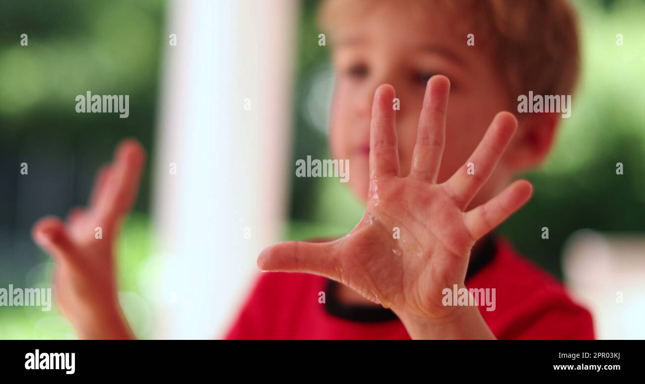 Cute child showing hands wanting napking. Adorable infant kid calling ...