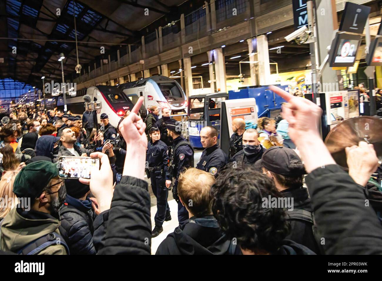 (EDITOR'S NOTE: Image depicts profanity) Protesters make gestures ...