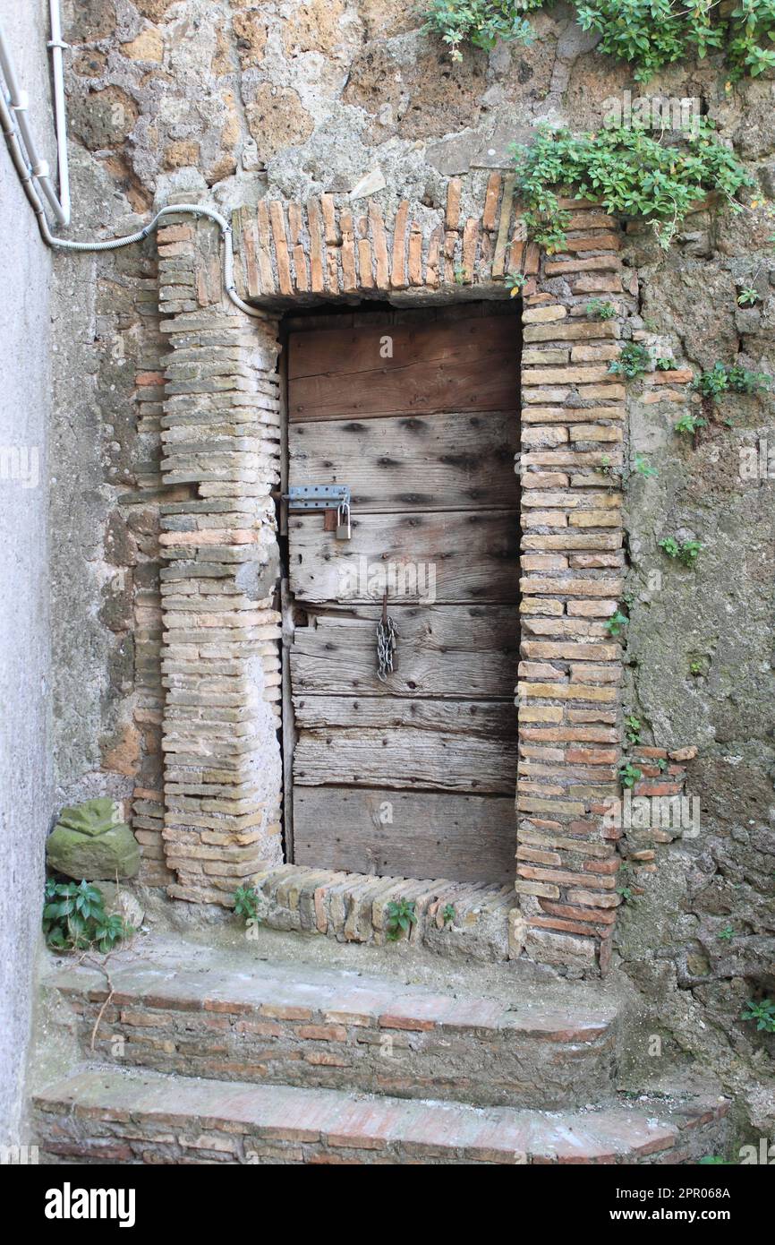 Ancient wood front door of a old medieval house Stock Photo - Alamy