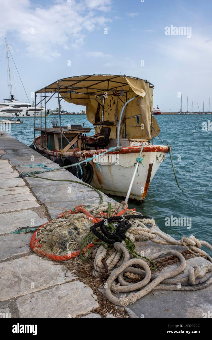 small old rustic vintage greek fishing boat traditional style boat in a ...