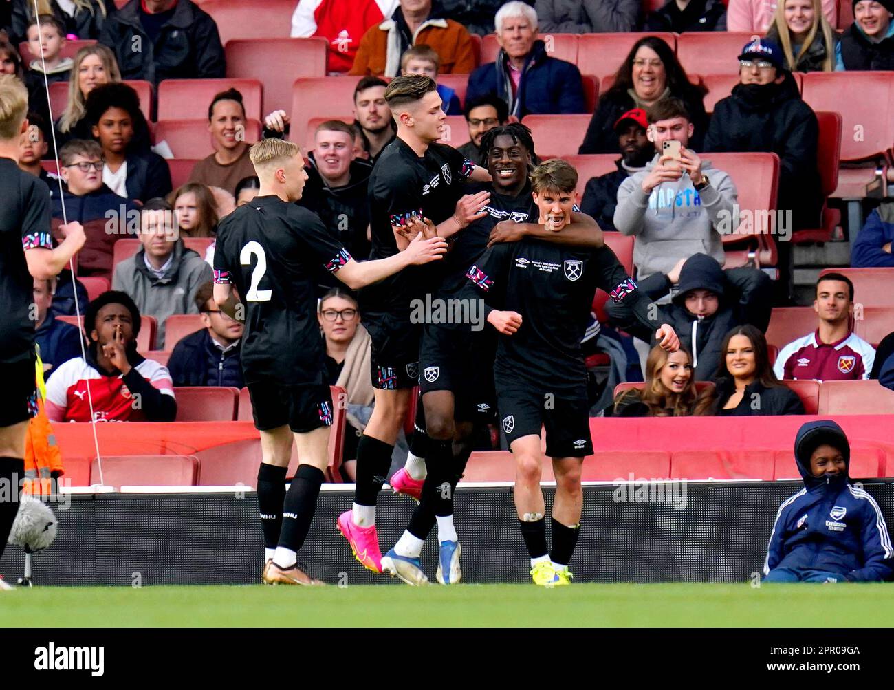 West Ham United's George Earthy celebrates with his team-mates after ...