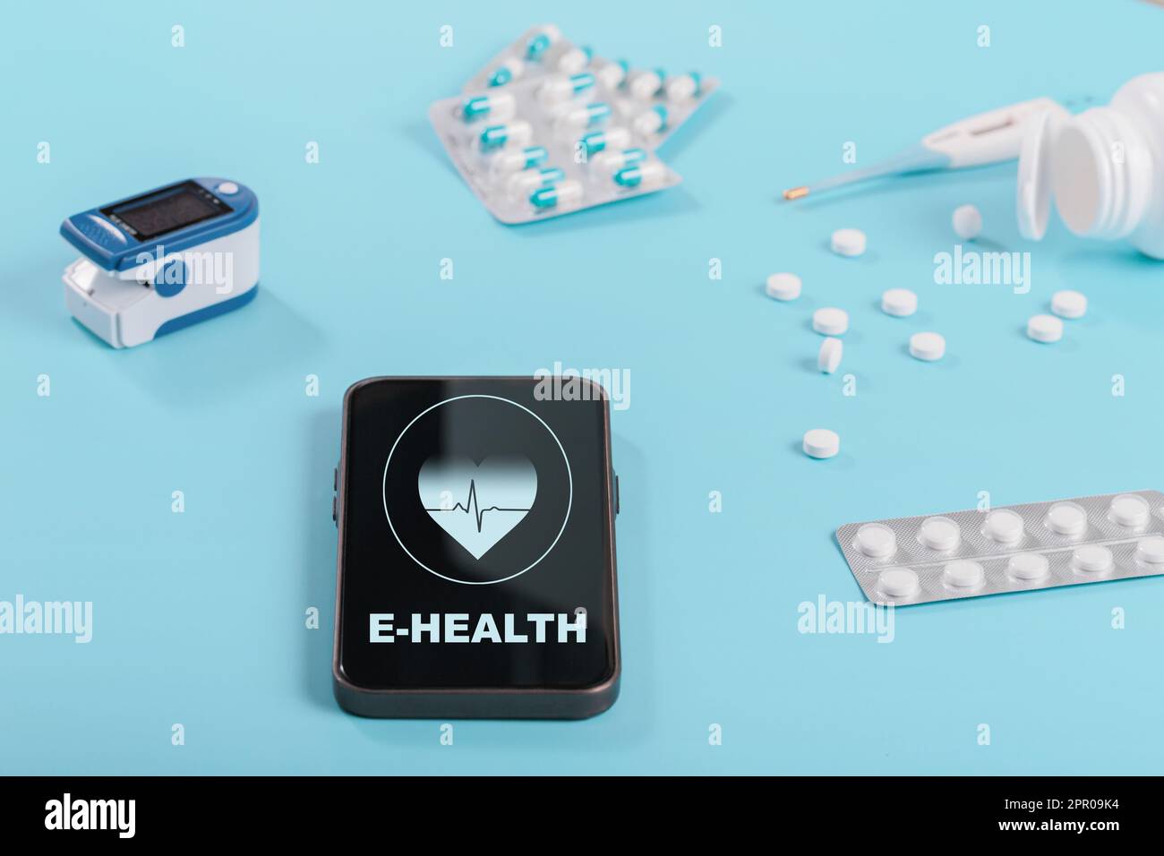 E-Health on smartphone screen with Pulse oximeter and medical ...